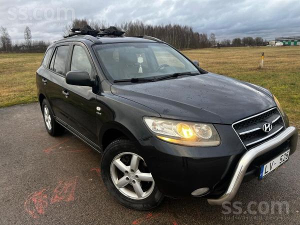 Black Hyundai Santa Fe 2006 in Riga, with an engine capacity of 2.20 L and mileage of 271 thousand km for 3450 €, photo 2 on AUTOMOTO.COM.LV