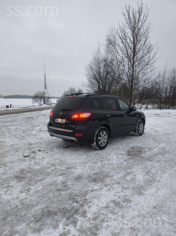Melns Hyundai Santa Fe 2006 Rīga, ar dzinēja tilpumu 2.20 L un nobraukumu 342 tūkst. km par 4450 €, foto 3 vietnē AUTOMOTO.COM.LV