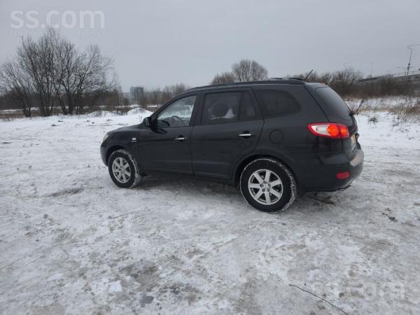 Melns Hyundai Santa Fe 2006 Rīga, ar dzinēja tilpumu 2.20 L un nobraukumu 342 tūkst. km par 4450 €, foto 5 vietnē AUTOMOTO.COM.LV