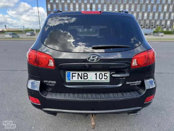 Black Hyundai Santa Fe 2006 in Kaunas, with an engine capacity of 2.20 L and mileage of 300 thousand km for 3199 €, photo 4 on AUTOMOTO.COM.LV