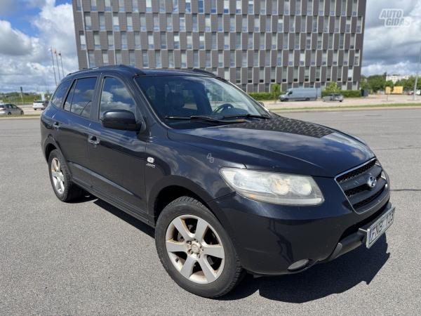 Black Hyundai Santa Fe 2006 in Kaunas, with an engine capacity of 2.20 L and mileage of 300 thousand km for 3199 €, photo 7 on AUTOMOTO.COM.LV