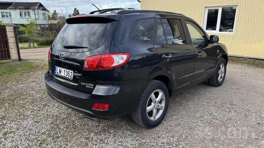 Melns Hyundai Santa Fe 2006 Rēzekne, ar dzinēja tilpumu 2.20 L un nobraukumu 246 tūkst. km par 2950 €, foto 5 vietnē AUTOMOTO.COM.LV