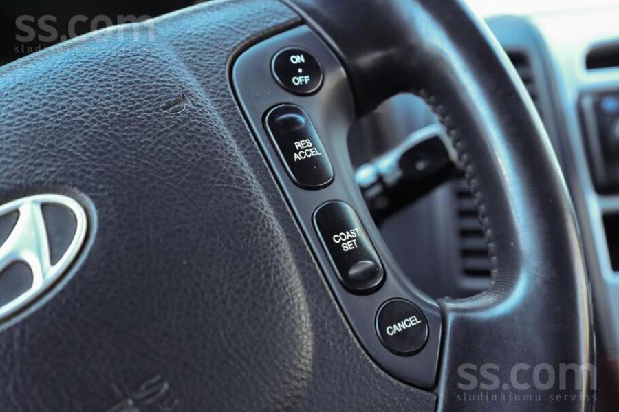 Melns Hyundai Santa Fe 2006 Rīga, ar dzinēja tilpumu 2.20 L un nobraukumu 0 tūkst. km par 2995 €, foto 19 vietnē AUTOMOTO.COM.LV