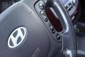 Melns Hyundai Santa Fe 2006 Rīga, ar dzinēja tilpumu 2.20 L un nobraukumu 0 tūkst. km par 2995 €, foto 16 vietnē AUTOMOTO.COM.LV