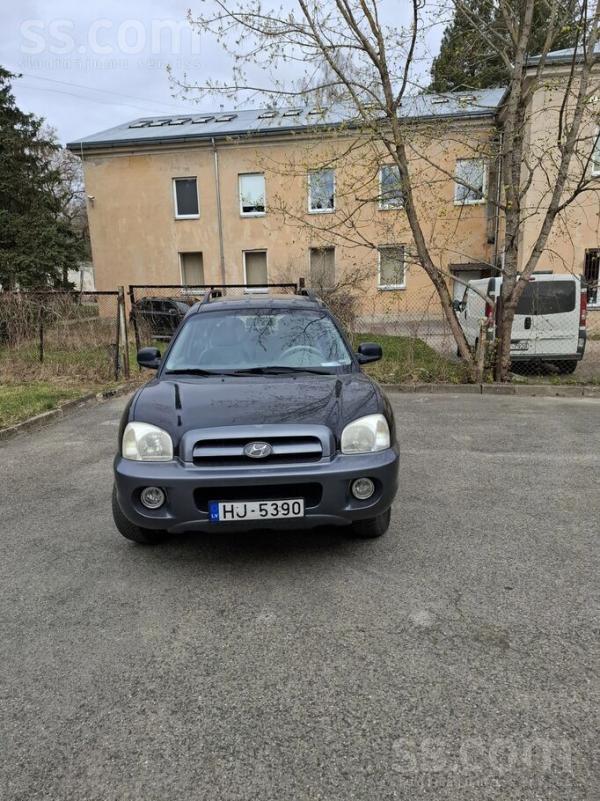 Melns Hyundai Santa Fe 2006 Rīga, ar dzinēja tilpumu 2.70 L un nobraukumu 328 tūkst. km par 2500 €, foto 2 vietnē AUTOMOTO.COM.LV