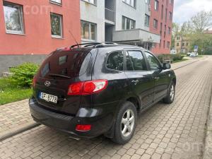 Black Hyundai Santa Fe 2006 in Riga, with an engine capacity of 2.20 L and mileage of 291 thousand km for 2900 €, photo 4 on AUTOMOTO.COM.LV