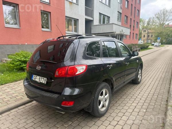 Melns Hyundai Santa Fe 2006 Rīga, ar dzinēja tilpumu 2.20 L un nobraukumu 291 tūkst. km par 2900 €, foto 3 vietnē AUTOMOTO.COM.LV