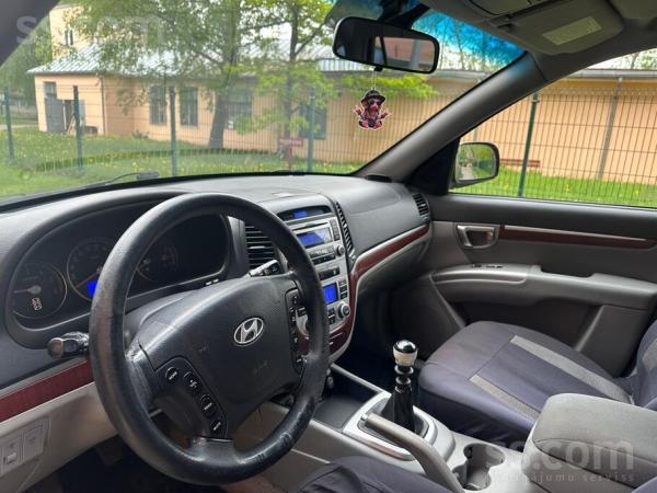 Melns Hyundai Santa Fe 2006 Rīga, ar dzinēja tilpumu 2.20 L un nobraukumu 291 tūkst. km par 2900 €, foto 4 vietnē AUTOMOTO.COM.LV