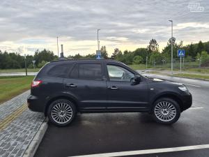 Melns Hyundai Santa Fe 2006 Gargždai, ar dzinēja tilpumu 2.20 L un nobraukumu 159 tūkst. km par 4700 €, foto  vietnē AUTOMOTO.COM.LV