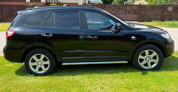 Black Hyundai Santa Fe 2006 in Kaunas, with an engine capacity of 2.19 L and mileage of 251 thousand km for 3000 €, photo 4 on AUTOMOTO.COM.LV