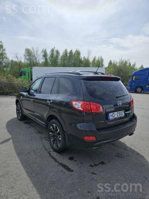 Melns Hyundai Santa Fe 2006 Rīga, ar dzinēja tilpumu 2.20 L un nobraukumu 264 tūkst. km par 3600 €, foto 4 vietnē AUTOMOTO.COM.LV