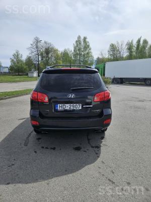 Melns Hyundai Santa Fe 2006 Rīga, ar dzinēja tilpumu 2.20 L un nobraukumu 264 tūkst. km par 3600 €, foto 5 vietnē AUTOMOTO.COM.LV