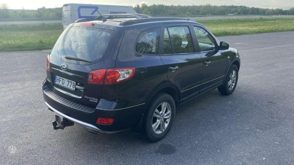 Black Hyundai Santa Fe 2006 in Prienai, with an engine capacity of 2.19 L and mileage of 180 thousand km for 3200 €, photo 5 on AUTOMOTO.COM.LV