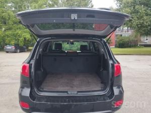 Melns Hyundai Santa Fe 2006 Rīga, ar dzinēja tilpumu 2.20 L un nobraukumu 365 tūkst. km par 3500 €, foto 6 vietnē AUTOMOTO.COM.LV