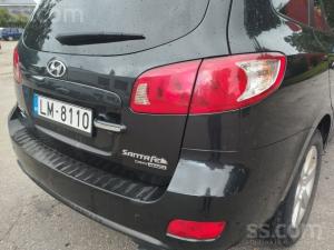 Melns Hyundai Santa Fe 2006 Rīga, ar dzinēja tilpumu 2.20 L un nobraukumu 365 tūkst. km par 3500 €, foto 7 vietnē AUTOMOTO.COM.LV
