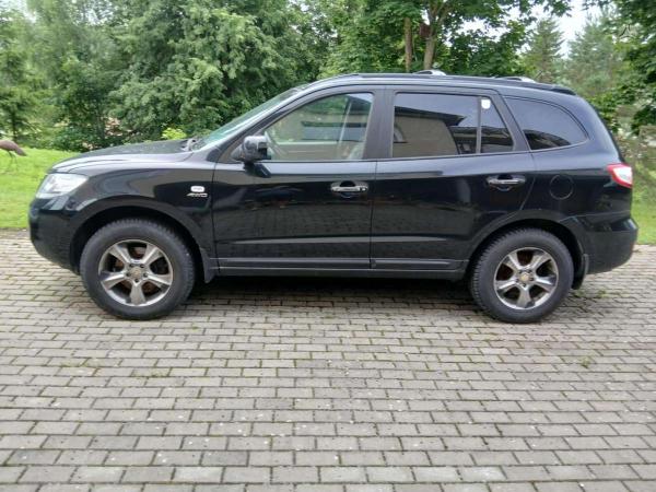 Melns Hyundai Santa Fe 2006 Ukmergė, ar dzinēja tilpumu 2.19 L un nobraukumu 246 tūkst. km par 3400 €, foto 3 vietnē AUTOMOTO.COM.LV