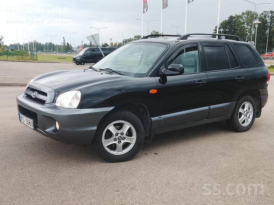 Black Hyundai Santa Fe 2006 in Riga, with an engine capacity of 2.40 L and mileage of 352 thousand km for 1600 €, photo 1 on AUTOMOTO.COM.LV