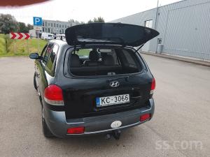 Black Hyundai Santa Fe 2006 in Riga, with an engine capacity of 2.40 L and mileage of 352 thousand km for 1600 €, photo 11 on AUTOMOTO.COM.LV