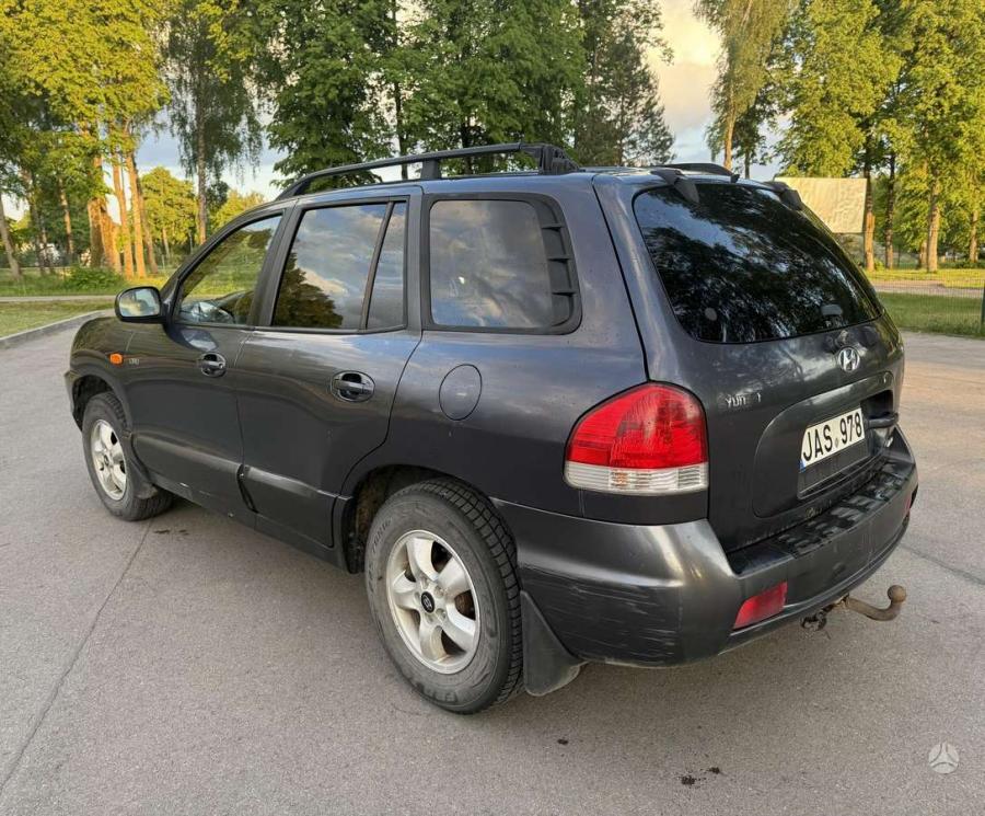 Melns Hyundai Santa Fe 2006 Tauragė, ar dzinēja tilpumu 1.99 L un nobraukumu 372 tūkst. km par 1550 €, foto 4 vietnē AUTOMOTO.COM.LV
