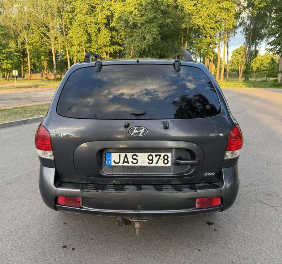 Melns Hyundai Santa Fe 2006 Tauragė, ar dzinēja tilpumu 1.99 L un nobraukumu 372 tūkst. km par 1550 €, foto 5 vietnē AUTOMOTO.COM.LV