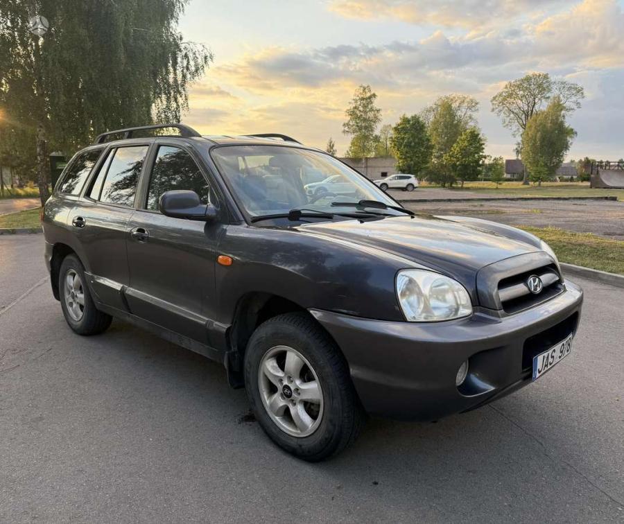 Melns Hyundai Santa Fe 2006 Tauragė, ar dzinēja tilpumu 1.99 L un nobraukumu 372 tūkst. km par 1550 €, foto 8 vietnē AUTOMOTO.COM.LV