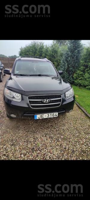 Melns Hyundai Santa Fe 2006 Rīga, ar dzinēja tilpumu 2.20 L un nobraukumu 0 tūkst. km par 2800 €, foto  vietnē AUTOMOTO.COM.LV