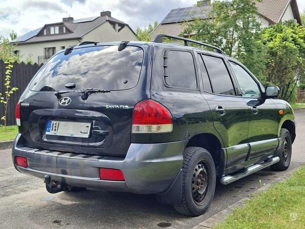Melns Hyundai Santa Fe 2006 Viļņa, ar dzinēja tilpumu 2.40 L un nobraukumu 278 tūkst. km par 650 €, foto 2 vietnē AUTOMOTO.COM.LV