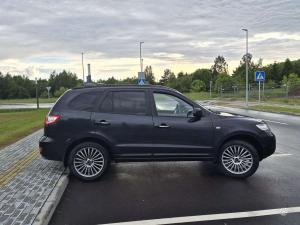 Melns Hyundai Santa Fe 2006 Gargždai, ar dzinēja tilpumu 2.19 L un nobraukumu 159 tūkst. km par 4300 €, foto  vietnē AUTOMOTO.COM.LV