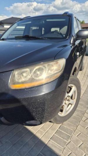 Melns Hyundai Santa Fe 2006 Klaipėda, ar dzinēja tilpumu 2.19 L un nobraukumu 390 tūkst. km par 1850 €, foto 15 vietnē AUTOMOTO.COM.LV