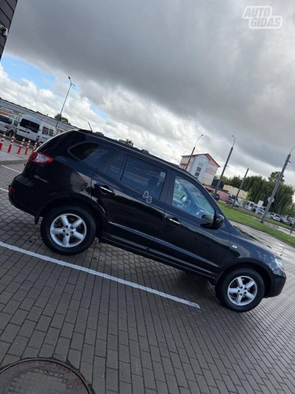 Hyundai Santa Fe 2006 KauÅa vietnÄ Melns Hyundai Santa Fe 2006 KauÅa, ar dzinÄja tilpumu 2.20 L un nobraukumu 225 tÅ«kst. km par 3750 ā¬, foto 6 vietnÄ AUTOMOTO.COM.LV