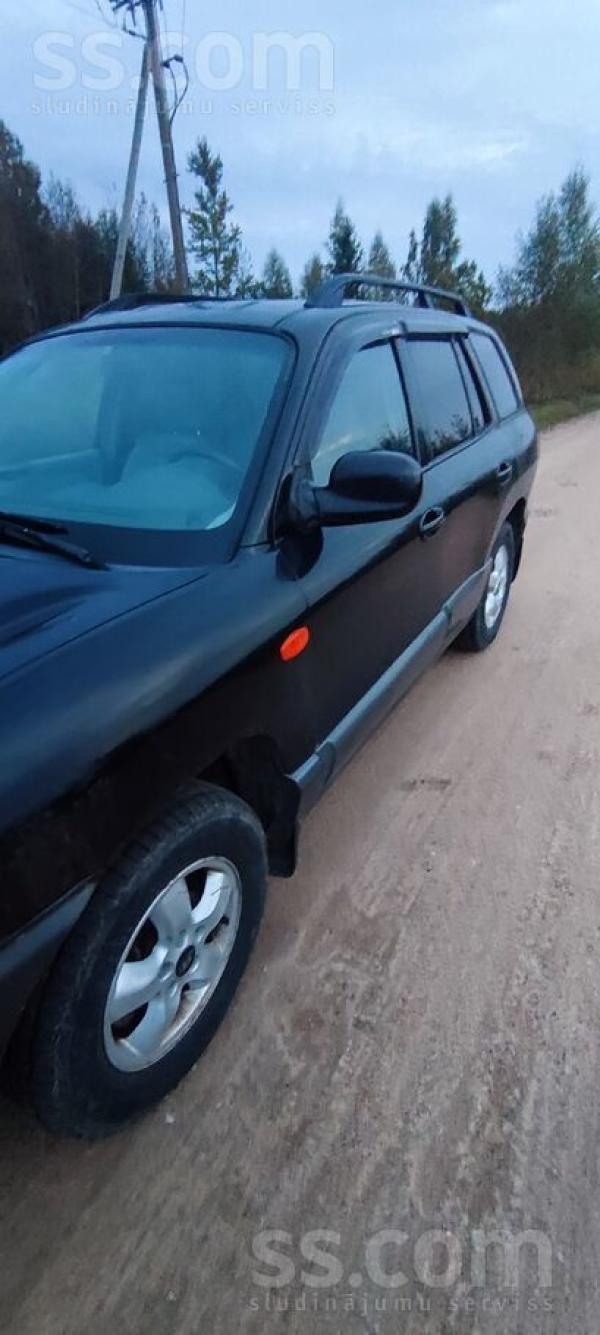 Melns Hyundai Santa Fe 2006 Daugavpils, ar dzinēja tilpumu 2.00 L un nobraukumu 320 tūkst. km par 1350 €, foto 7 vietnē AUTOMOTO.COM.LV