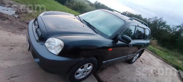 Melns Hyundai Santa Fe 2006 Daugavpils, ar dzinēja tilpumu 2.00 L un nobraukumu 320 tūkst. km par 1350 €, foto 9 vietnē AUTOMOTO.COM.LV