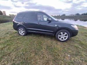 Melns Hyundai Santa Fe 2007 Daugavpils, ar dzinēja tilpumu 2.20 L un nobraukumu 224 tūkst. km par 3300 €, foto 4 vietnē AUTOMOTO.COM.LV