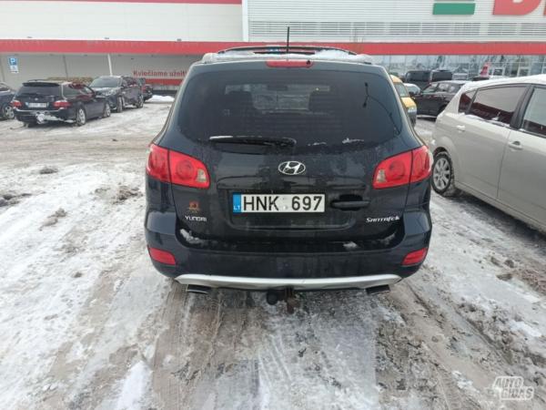 Black Hyundai Santa Fe 2007 in Panevezys, with an engine capacity of 2.20 L and mileage of 336 thousand km for 2500 €, photo 6 on AUTOMOTO.COM.LV