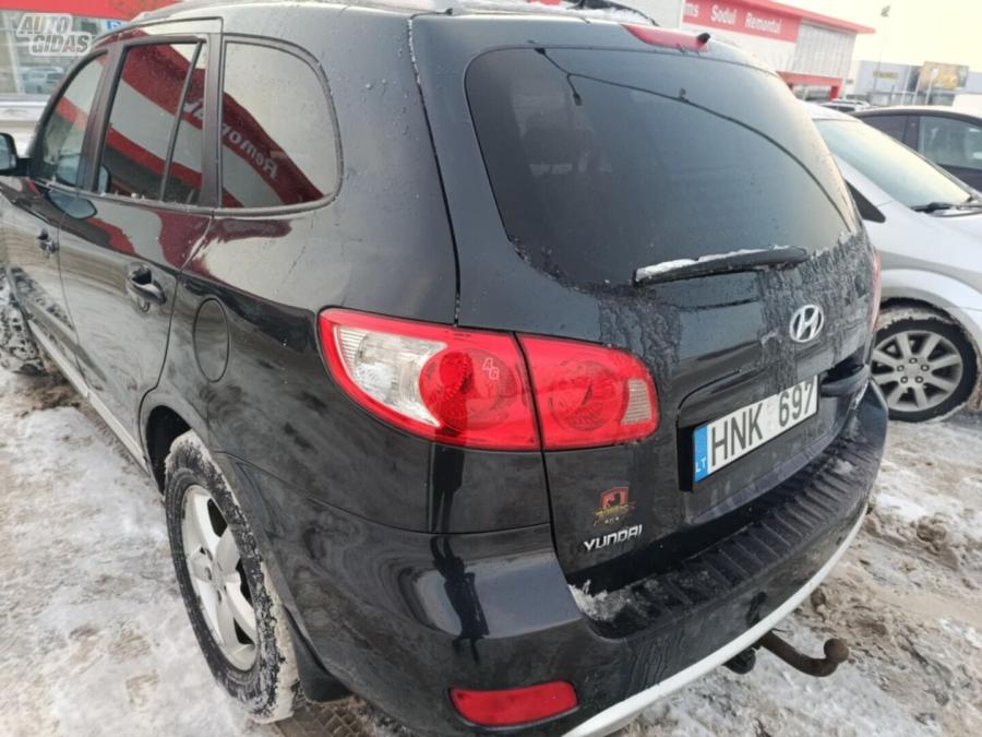 Melns Hyundai Santa Fe 2007 Panevēža, ar dzinēja tilpumu 2.20 L un nobraukumu 336 tūkst. km par 2500 €, foto 10 vietnē AUTOMOTO.COM.LV