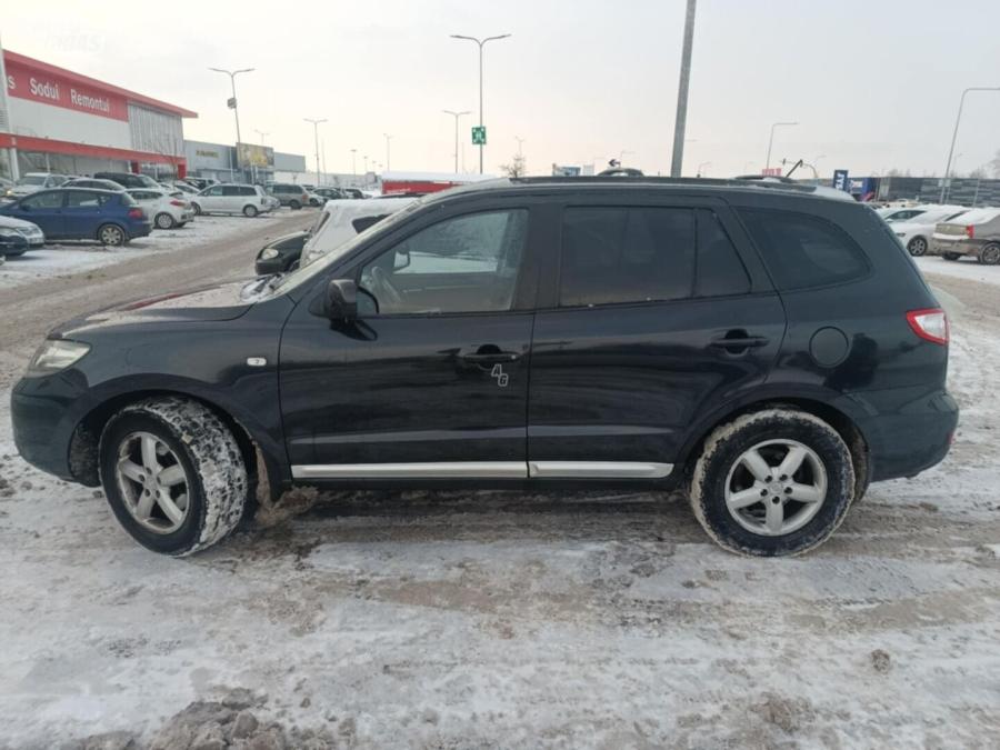 Melns Hyundai Santa Fe 2007 Panevēža, ar dzinēja tilpumu 2.20 L un nobraukumu 336 tūkst. km par 2500 €, foto 11 vietnē AUTOMOTO.COM.LV