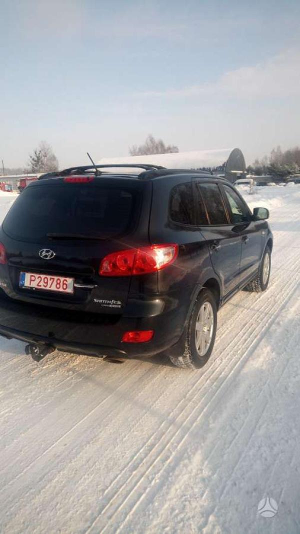 Black Hyundai Santa Fe 2007 in Prienai, with an engine capacity of 2.20 L and mileage of 162 thousand km for 4900 €, photo 6 on AUTOMOTO.COM.LV