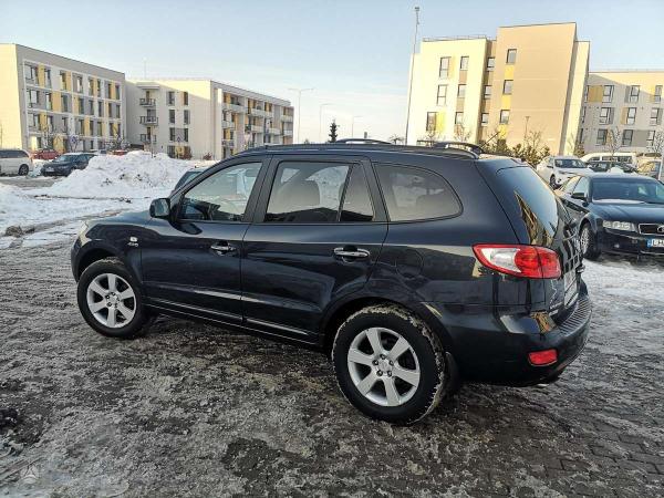 Black Hyundai Santa Fe 2007 in Klaipeda, with an engine capacity of 2.20 L and mileage of 286 thousand km for 2999 €, photo 4 on AUTOMOTO.COM.LV