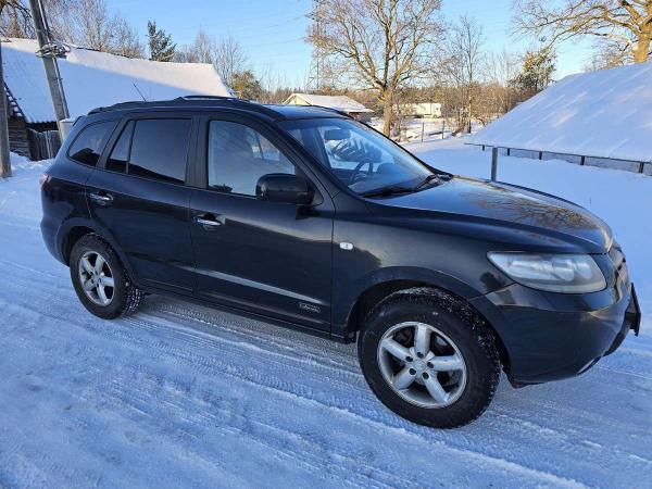 Melns Hyundai Santa Fe 2007 Kauņa, ar dzinēja tilpumu 2.19 L un nobraukumu 207 tūkst. km par 3450 €, foto 6 vietnē AUTOMOTO.COM.LV