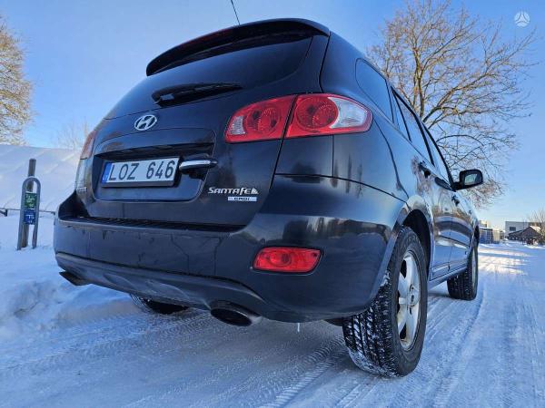 Melns Hyundai Santa Fe 2007 Kauņa, ar dzinēja tilpumu 2.19 L un nobraukumu 207 tūkst. km par 3450 €, foto 10 vietnē AUTOMOTO.COM.LV