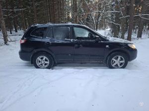 Melns Hyundai Santa Fe 2007 Tauragė, ar dzinēja tilpumu 2.19 L un nobraukumu 347 tūkst. km par 2999 €, foto 13 vietnē AUTOMOTO.COM.LV