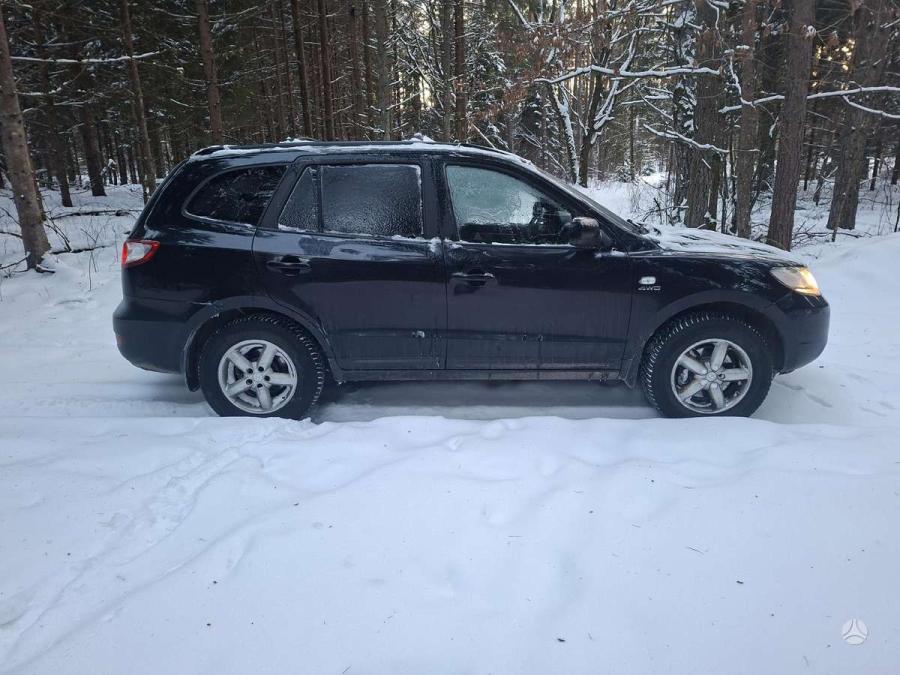 Melns Hyundai Santa Fe 2007 Tauragė, ar dzinēja tilpumu 2.19 L un nobraukumu 347 tūkst. km par 2999 €, foto 13 vietnē AUTOMOTO.COM.LV