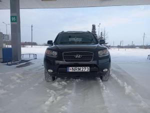 Black Hyundai Santa Fe 2007 in Salcininkai, with an engine capacity of 2.19 L and mileage of 286 thousand km for 4600 €, photo 4 on AUTOMOTO.COM.LV