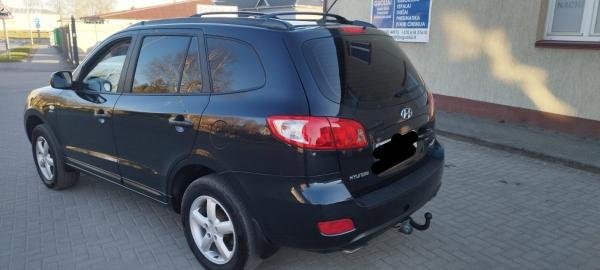 Black Hyundai Santa Fe 2007 in Taurage, with an engine capacity of 2.20 L and mileage of 264 thousand km for 1799 €, photo 5 on AUTOMOTO.COM.LV