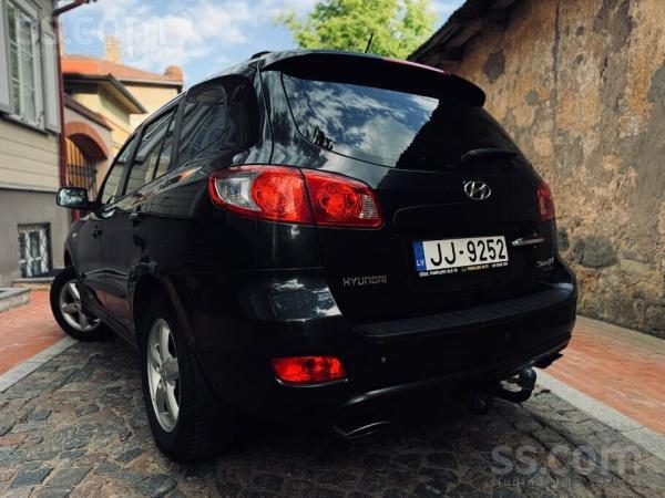 Melns Hyundai Santa Fe 2007 Cēsis, ar dzinēja tilpumu 2.20 L un nobraukumu 0 tūkst. km par 3990 €, foto 7 vietnē AUTOMOTO.COM.LV