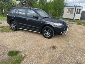 Black Hyundai Santa Fe 2007 in Riga, with an engine capacity of 2.20 L and mileage of 0 thousand km for 4499 €, photo 6 on AUTOMOTO.COM.LV