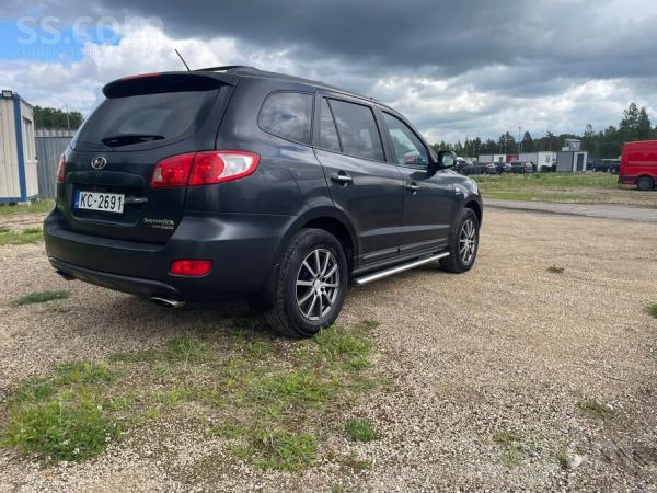 Black Hyundai Santa Fe 2007 in Riga, with an engine capacity of 2.20 L and mileage of 0 thousand km for 4499 €, photo 10 on AUTOMOTO.COM.LV