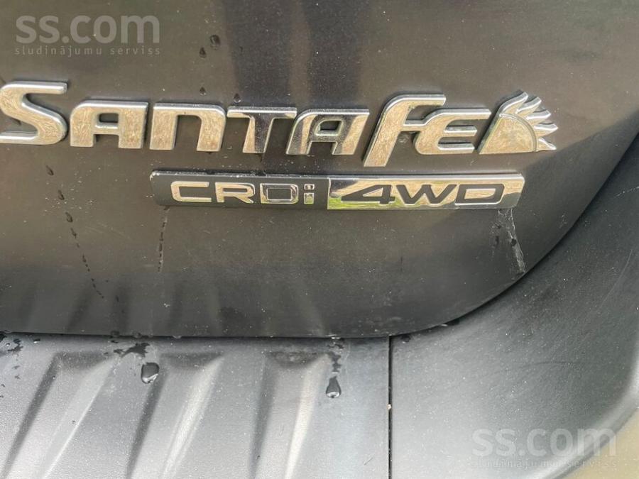 Black Hyundai Santa Fe 2007 in Riga, with an engine capacity of 2.20 L and mileage of 0 thousand km for 4499 €, photo 14 on AUTOMOTO.COM.LV