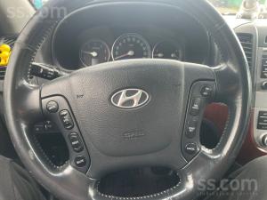 Black Hyundai Santa Fe 2007 in Riga, with an engine capacity of 2.20 L and mileage of 0 thousand km for 4499 €, photo 23 on AUTOMOTO.COM.LV