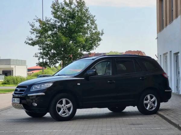 Black Hyundai Santa Fe 2007 in Jelgava, with an engine capacity of 2.20 L and mileage of 304 thousand km for 3290 €, photo 7 on AUTOMOTO.COM.LV